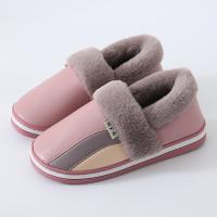 China Slippers women winter all-inclusive heel non-slip couple warm waterproof PU leather home indoor shoes for men for sale