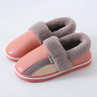 China Slippers women winter all-inclusive heel non-slip couple warm waterproof PU leather home indoor shoes for men for sale