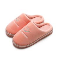 China Hot selling 2021 new fashion soft plush winter slippers smile patterns vamp non-slip couple home shoes in stock for sale