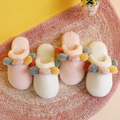 China Cute Plush flowers shape slippers winter female thick-soled non-slip indoor and outdoor warm home shoes ladies closed shoes for sale