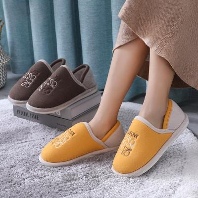 China New hot sale women winter slippers non-slip warm indoor all-inclusive heel Coral fleece lining couple household shoes for sale