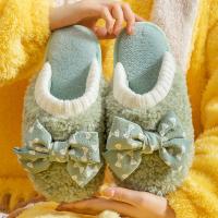 China Fashion Bow Plush Slippers Women Winter Warm Thick Bottom Anti-Slip Soft Bottom Couple Style House Indoor Men for sale
