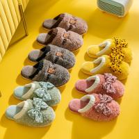 China Fashion Bow Plush Slippers Women Winter Warm Thick Bottom Anti-Slip Soft Bottom Couple Style House Indoor Men for sale