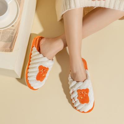 China Cute fashion solid color warm home indoor shoes soft plush PVC material anti-slip slippers autumn winter for sale