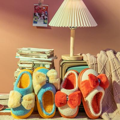 China New Design Cute Bow Slippers Women Winter Home Thick Bottom Warn Non-Slip Couple Style Plush Indoor Cartoon Men for sale