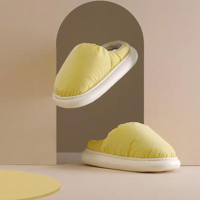 China 2021 New Style Pineapple Bread Warm Slippers Feather Waterproof Thermal Thick Bottom Couple Household Indoor Shoes for sale
