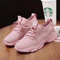 China 2022 new flying woven mesh sneakers women fashion casual shoes running wholesale soft sole Walking Style Shoes for sale