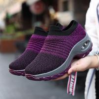 China Fashion Breathable flyknit fabric spring and summer flat women casual sneakers sports walking style shoes for sale