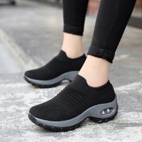 China Fashion Breathable flyknit fabric spring and summer flat women casual sneakers sports walking style shoes for sale