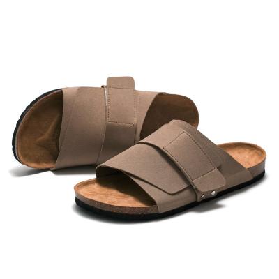 China 2021 ladies new fashion Adjustable buckles solid color cork bottom flat sandals and slippers women's outer wear home slippers for sale