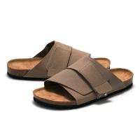 China 2021 ladies new fashion Adjustable buckles solid color cork bottom flat sandals and slippers women's outer wear home slippers for sale