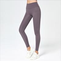 China Yoga clothes fitness pants women high waist peach hips trousers running sports summer thin out wear leggings for sale