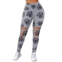 China Stylish cheap trousers ladies 2022 summer new leopard print fashion holes and tight nine-point pants women yoga leggings for sale