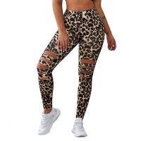 China Stylish cheap trousers ladies 2022 summer new leopard print fashion holes and tight nine-point pants women yoga leggings for sale