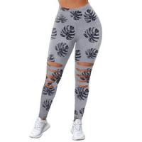 China Stylish cheap trousers ladies 2022 summer new leopard print fashion holes and tight nine-point pants women yoga leggings for sale