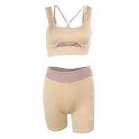 China 2022 new solid color fashion trend sports hollow out vest tight trousers women tracksuits 2 piece set Fitness Yoga Wear for sale