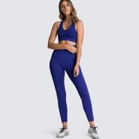 China Hot selling seamless yoga clothing set lift hip running fitness backless sports bra high waist pants tight women sportswear for sale