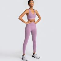 China Hot selling seamless yoga clothing set lift hip running fitness backless sports bra high waist pants tight women sportswear for sale