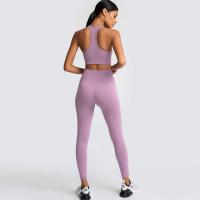 China Hot selling seamless yoga clothing set lift hip running fitness backless sports bra high waist pants tight women sportswear for sale
