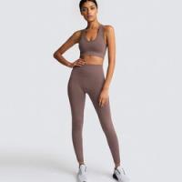 China Hot selling seamless yoga clothing set lift hip running fitness backless sports bra high waist pants tight women sportswear for sale