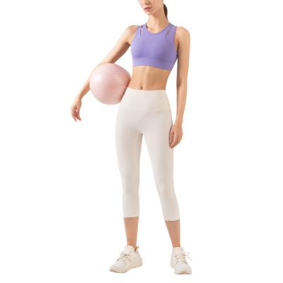 China 2021 summer women's cropped pants stretch sports high waist hip hip breathable nude feel fitness yoga pants for sale