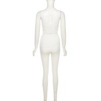 China 2021 summer new women's yoga suit solid color sexy suspenders crossover two pieces vest and tight trousers set for sale