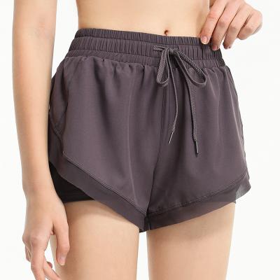 China 2021 new summer women's fashion pants breathable and quick-drying  stretch slim fitness yoga shorts solid color casual pants for sale