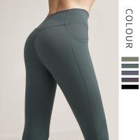China 2021 summer women's new fashion fitness trouser Peach hip tight waist casual yoga pants with side pocket leggings for women for sale