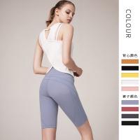 China 2021 new women sports set Irregular breathable vest solid color high waist quick dry exercise fitness peach buttocks shorts for sale