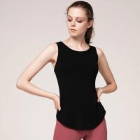 China 2021 new women sports set Irregular breathable vest solid color high waist quick dry exercise fitness peach buttocks shorts for sale
