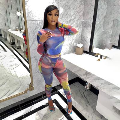 China wholesale ladies long sleeve gym wear sexy net yarn perspective printing tight sportswear casual two-piece  jumpsuit for sale