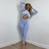 China hot sale women long sleeve jumpsuit 2021 new design solid color hollow out bodycon cross bandage sportswear in stock for sale