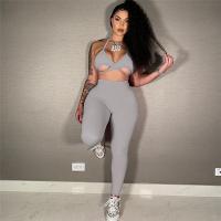 China ladies new sexy low-cut halter vest hanging neck crop tops tight long pants leisure two-piece sportswear for sale