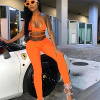 China ladies new sexy low-cut halter vest hanging neck crop tops tight long pants leisure two-piece sportswear for sale