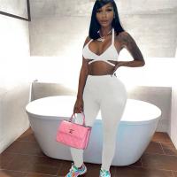 China ladies new sexy low-cut halter vest hanging neck crop tops tight long pants leisure two-piece sportswear for sale