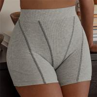 China Summer simple women solid color slim sleeveless fitness yoga set high waist lift hip tight shorts running sportswear for sale