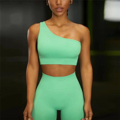 China Summer sportswear new women sexy sloping shoulder vest running gym wear tight high waist shorts sports fitness suit for sale