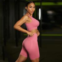 China Summer sportswear new women sexy sloping shoulder vest running gym wear tight high waist shorts sports fitness suit for sale