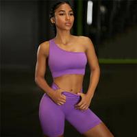 China Summer sportswear new women sexy sloping shoulder vest running gym wear tight high waist shorts sports fitness suit for sale