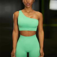 China Summer sportswear new women sexy sloping shoulder vest running gym wear tight high waist shorts sports fitness suit for sale