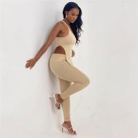 China Spring women fitness yoga clothing new fashion irregular sloping shoulder slim top high waist casual trousers suit for sale