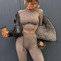 China Spring and Summer women running yoga set new sexy long sleeve tight top high waist trousers sports fitness suit for sale