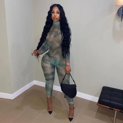 China 2021 New Women'S High Neck Long Sleeve sportswear Sexy Mesh See-Through Printed Jumpsuit  one piece yoga set for sale