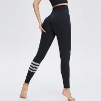 China New yoga pants contrast color stitching high waist fitness pants high elastic sports leggings women in stock women's trousers for sale