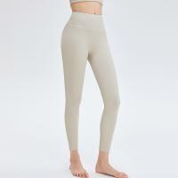 China Factory supply New threaded yoga pants simple style sports pants women tight solid color fitness Leggings for sale