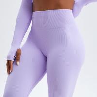 China New custom yoga pants women seamless high waist peach hip lift tight solid color fitness pants summer trousers women for sale