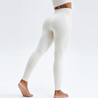 China New custom yoga pants women seamless high waist peach hip lift tight solid color fitness pants summer trousers women for sale