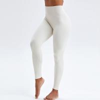 China New custom yoga pants women seamless high waist peach hip lift tight solid color fitness pants summer trousers women for sale