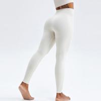 China New custom yoga pants women seamless high waist peach hip lift tight solid color fitness pants summer trousers women for sale