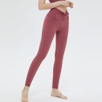 China Spot wholesale bowknot drawstring yoga pants women high waist hip lift sports pants tight fitness pants trousers women for sale